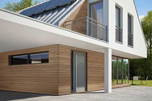 Haus mit Holzfassade und Putz - Moderne Architektur mit traditionellen ...